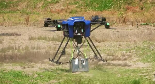 中電工業の送電鉄塔工事でSkyDriveの物流ドローン『SkyLift』が1.6トンの塗料を運搬 過酷な現場の労働環境改善と担い手確保へ ...